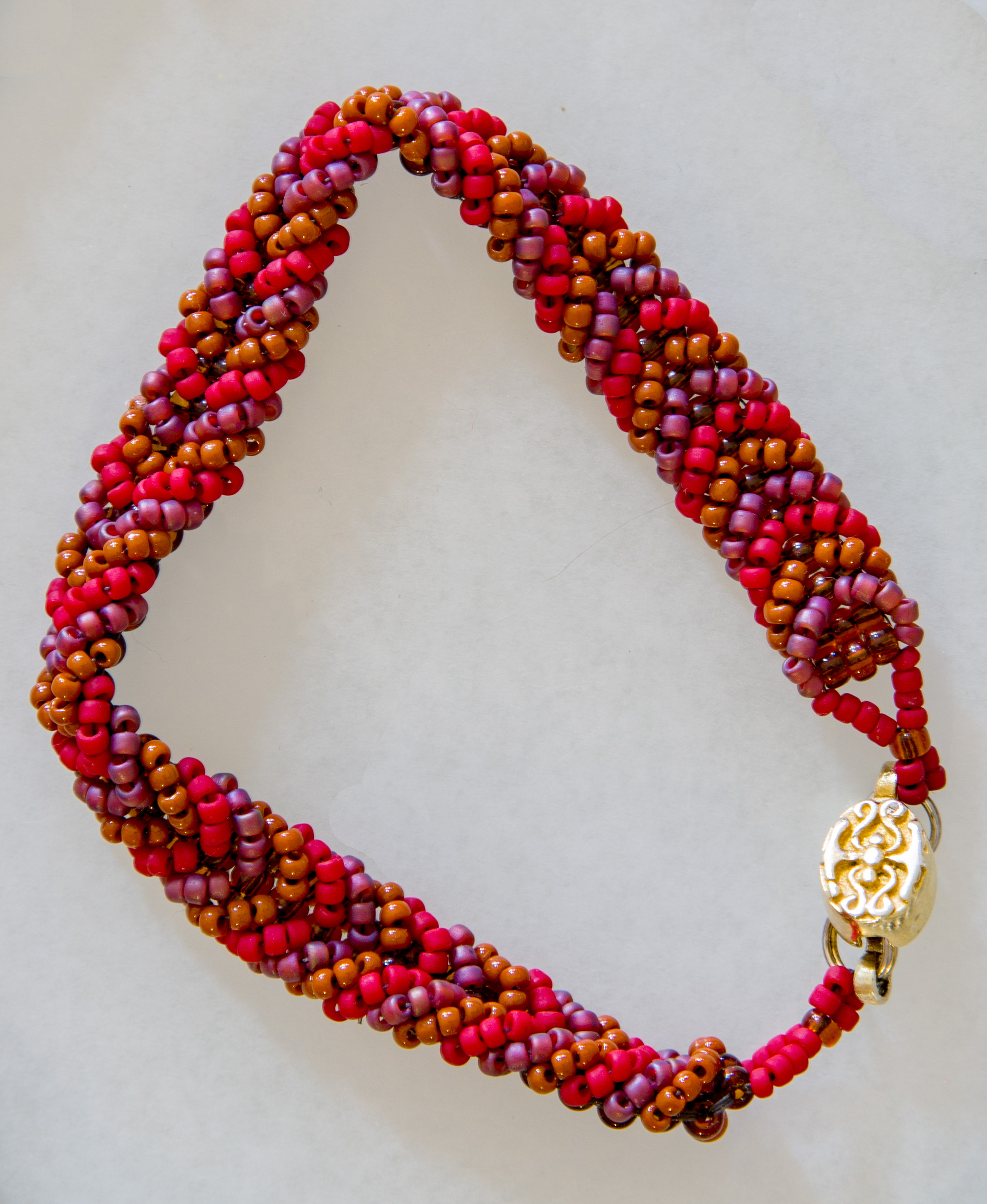 18. Red, Purple & Brown Seedbeads in Ladder Stitch Bracelet